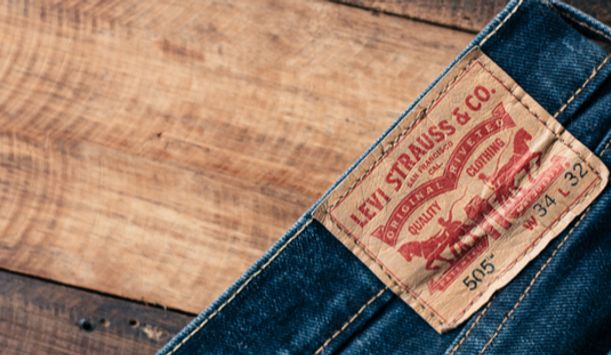 Levi’s to cut jobs globally after net income falls | NYSE:LEVI