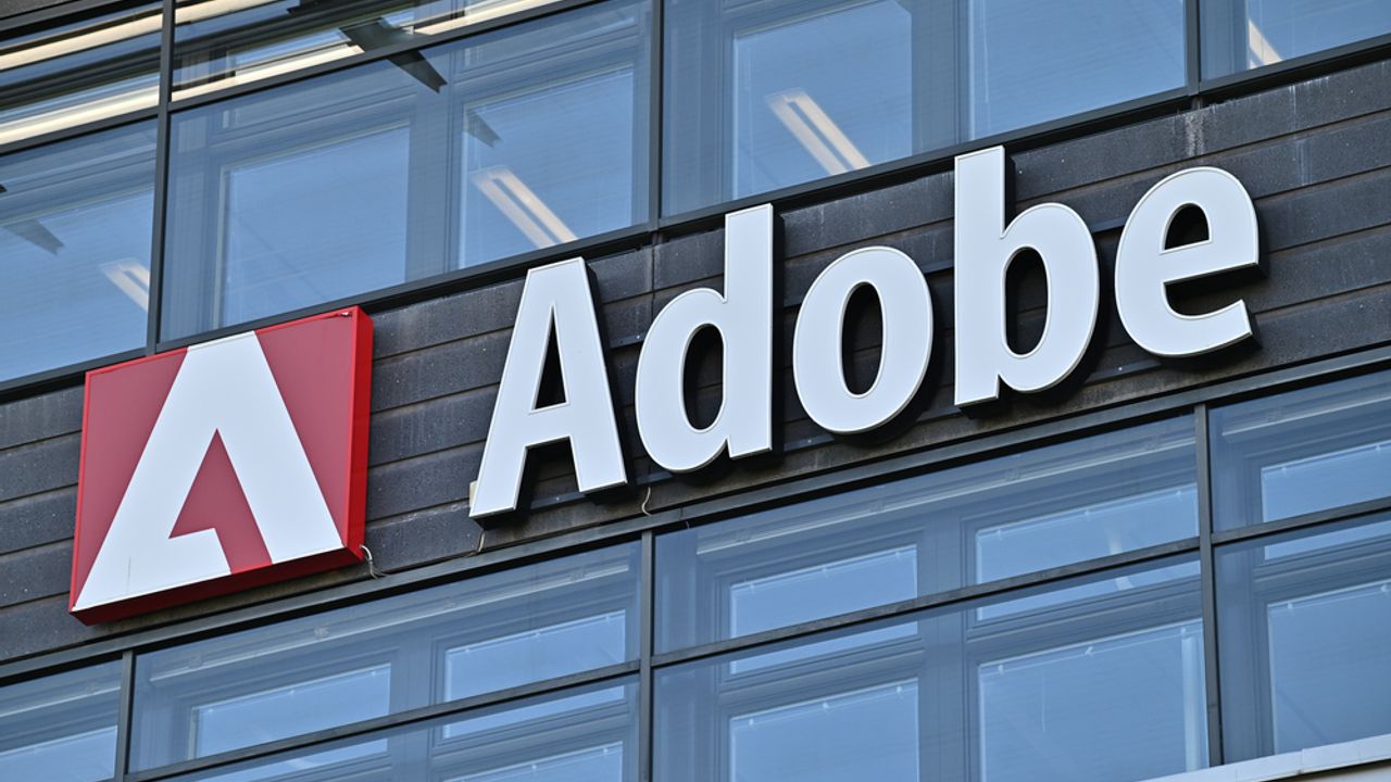 Adobe lifts full-year forecast as AI-driven demand fuels record revenue ...