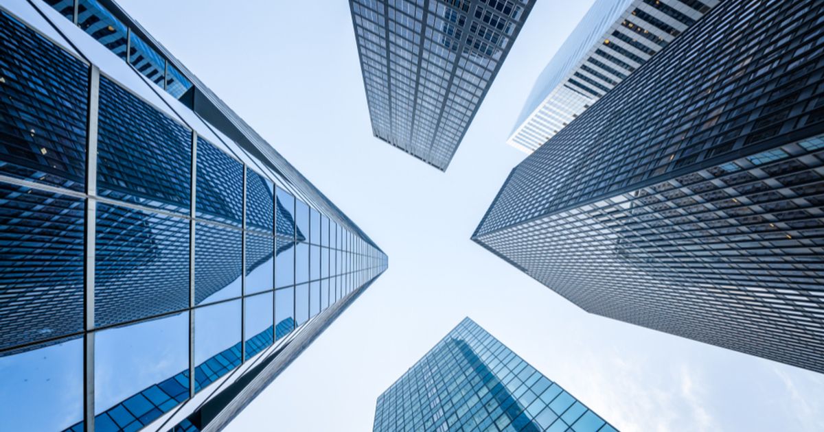 Dow, S&P rally but Nasdaq dragged down as trade uncertainty looms