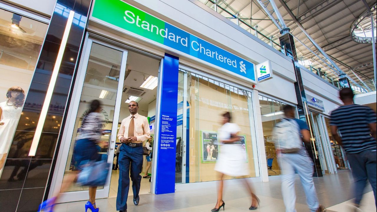 Standard Chartered shares climb to highest in 12 years after profit ...
