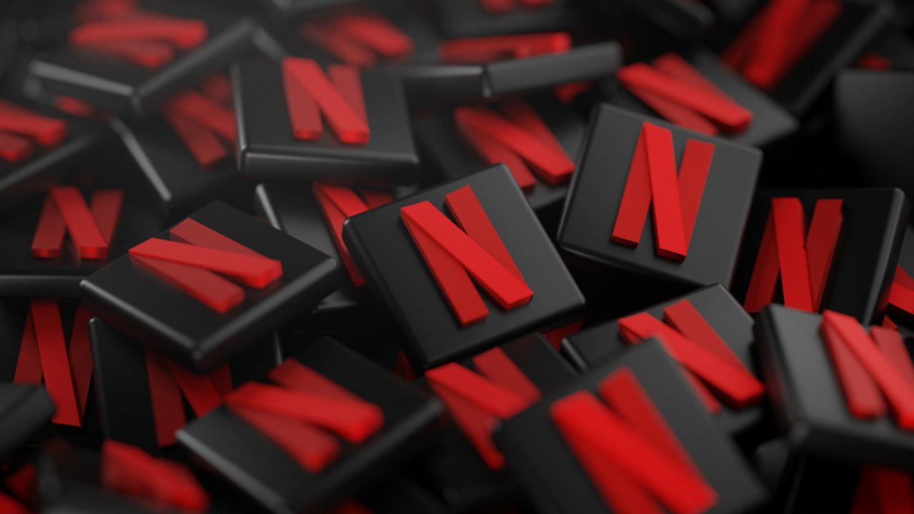 Netflix shares lag ahead of earnings, analysts lower price target on M ...